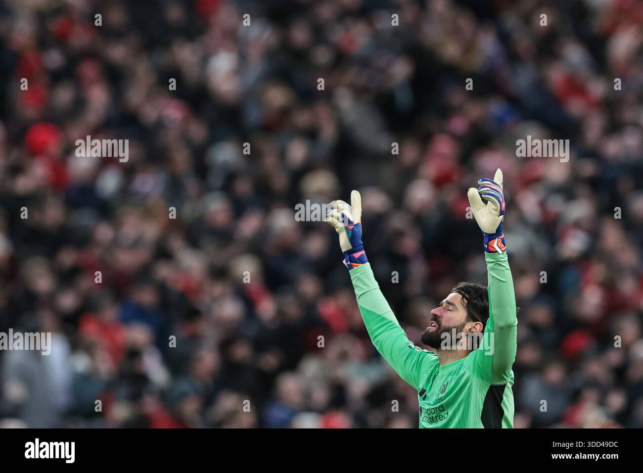Alisson Becker of Liverpool celebrates a goal during the Premier League ...