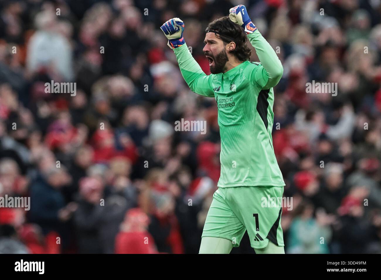 Alisson Becker of Liverpool celebrates a goal during the Premier League ...