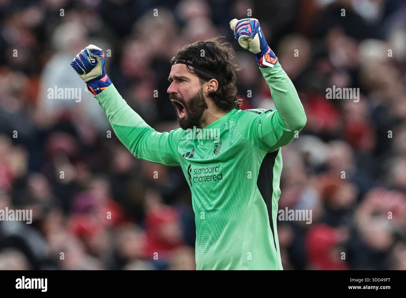 Alisson Becker of Liverpool celebrates a goal during the Premier League ...