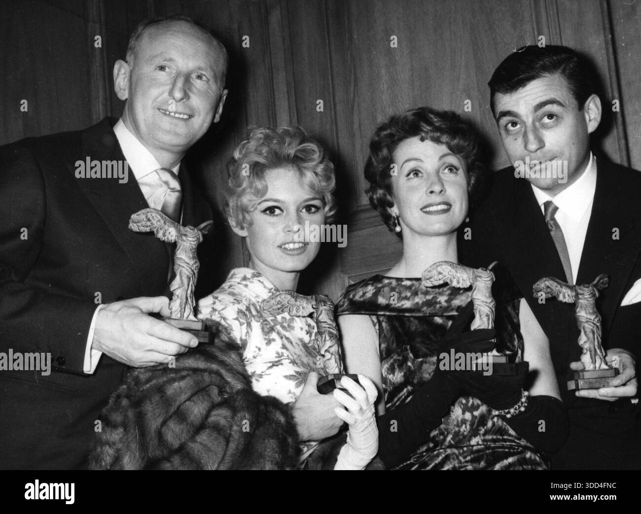 FILE - French screen stars from left, Andre Bourvil, Brigitte Bardot ...