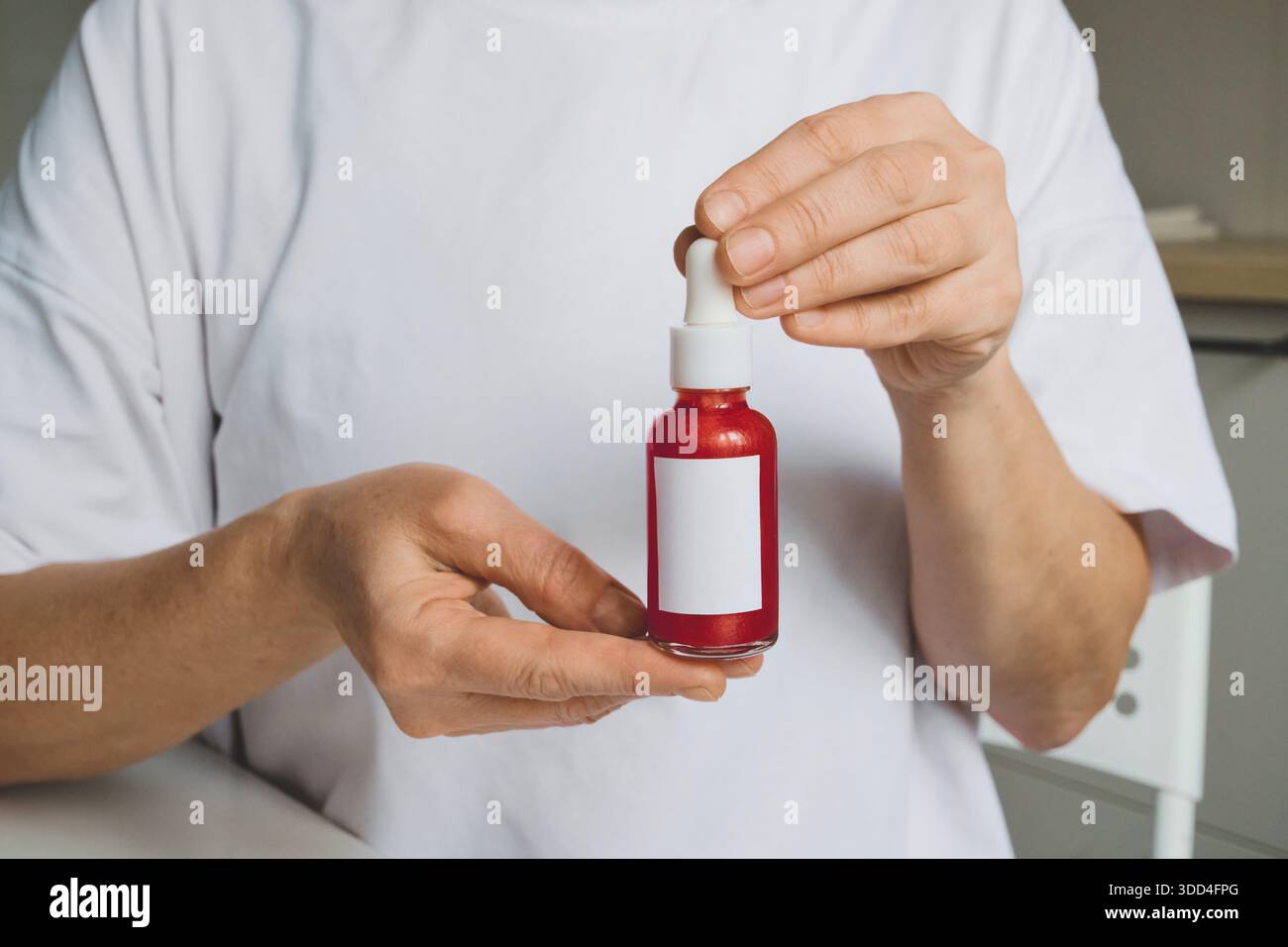 Woman presenting white cosmetic hi-res stock photography and images - Alamy