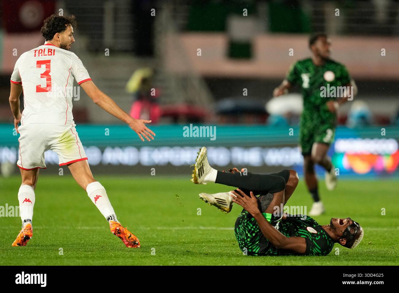 Nigeria's Victor Osimhen reacts after a challenge from Tunisia's ...