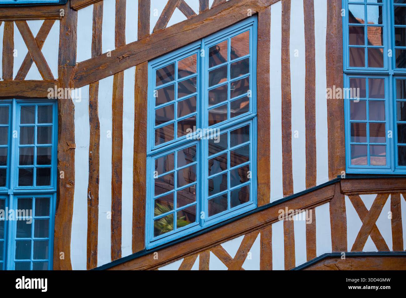Wide French house facade with large blue window. Architecture and ...