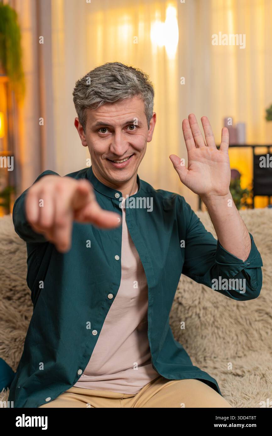 Young man excitedly shows hi-res stock photography and images - Alamy