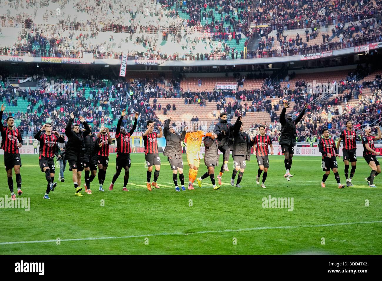 AC Milan's players salute fans after a Serie A soccer match between AC ...