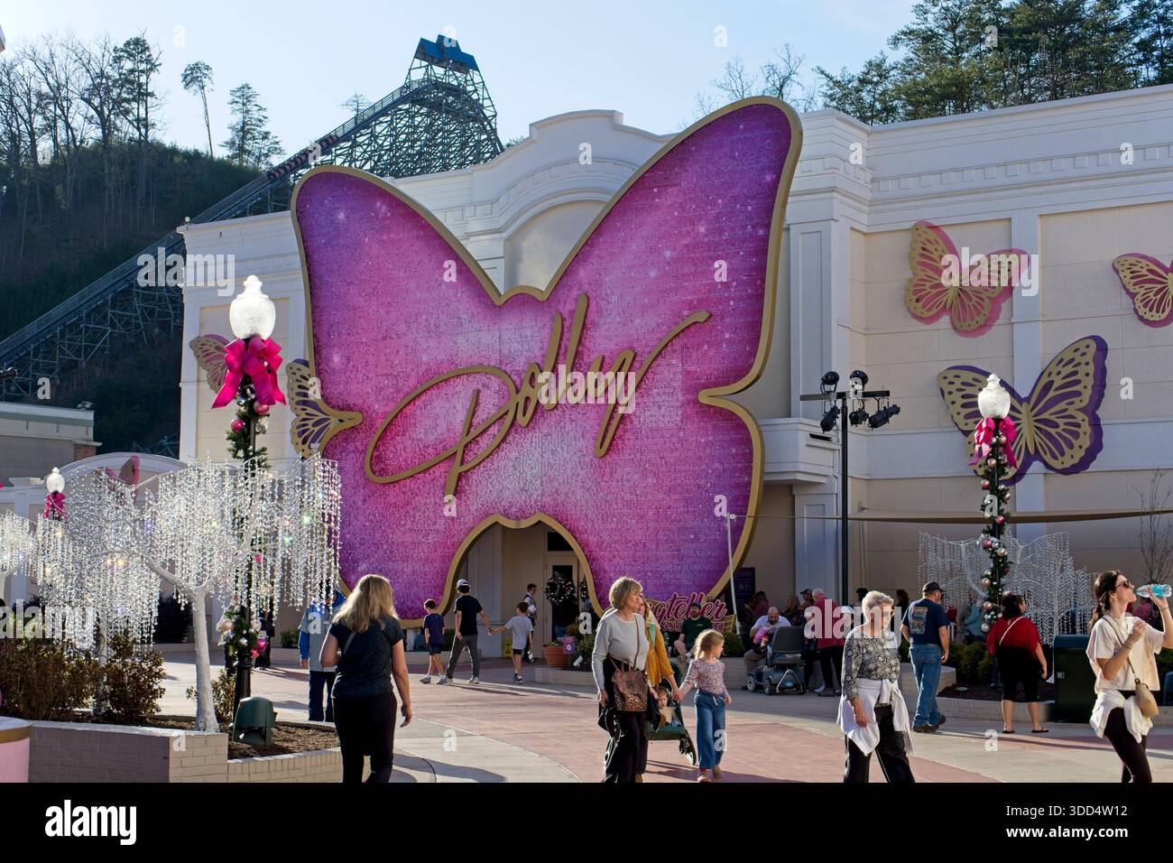 Large pink butterfly entrance sign at Dollywood theme park with ...