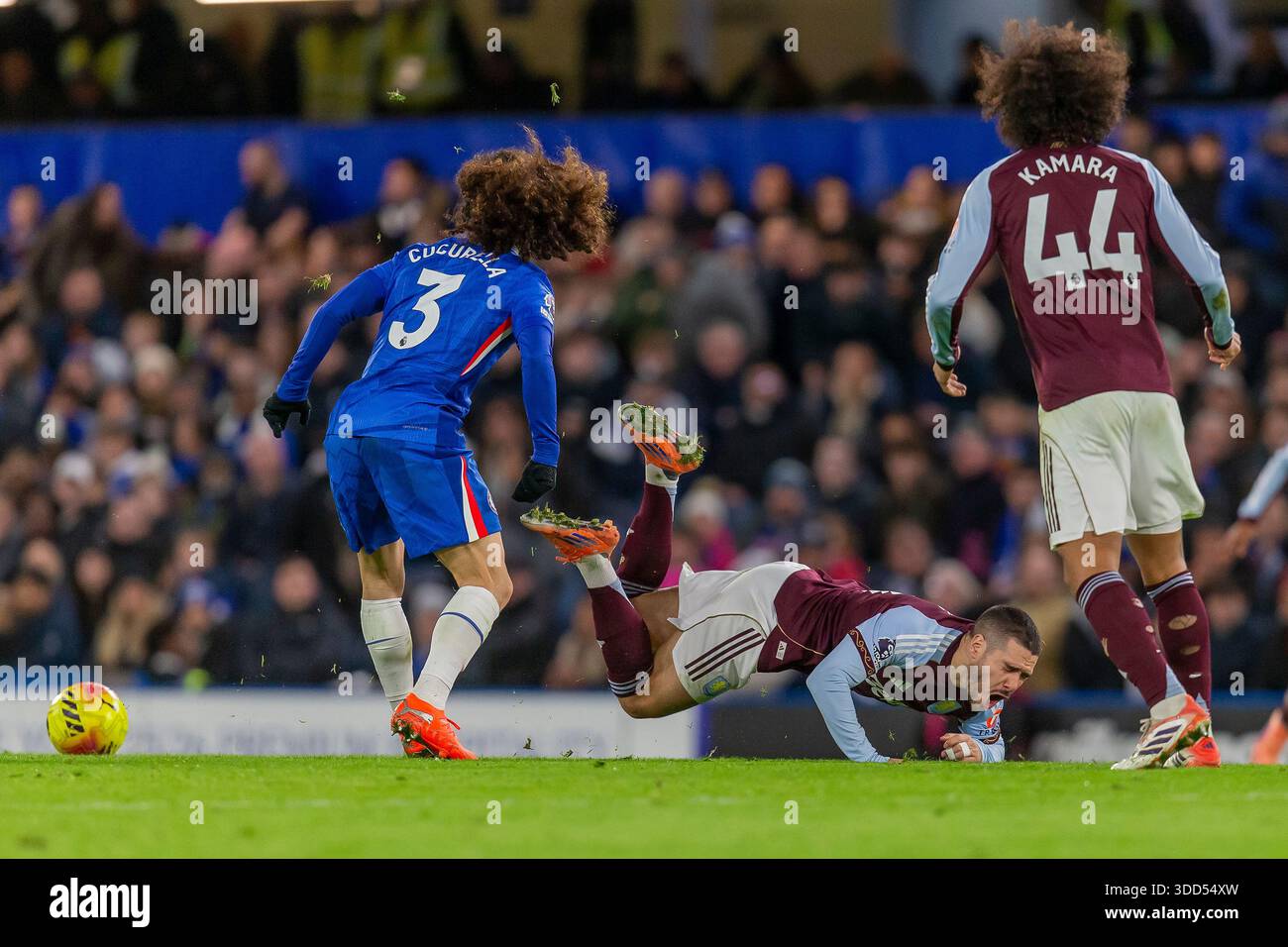 Marc Cucurella of Chelsea tackles Emi Buendía of Aston Villa during the ...