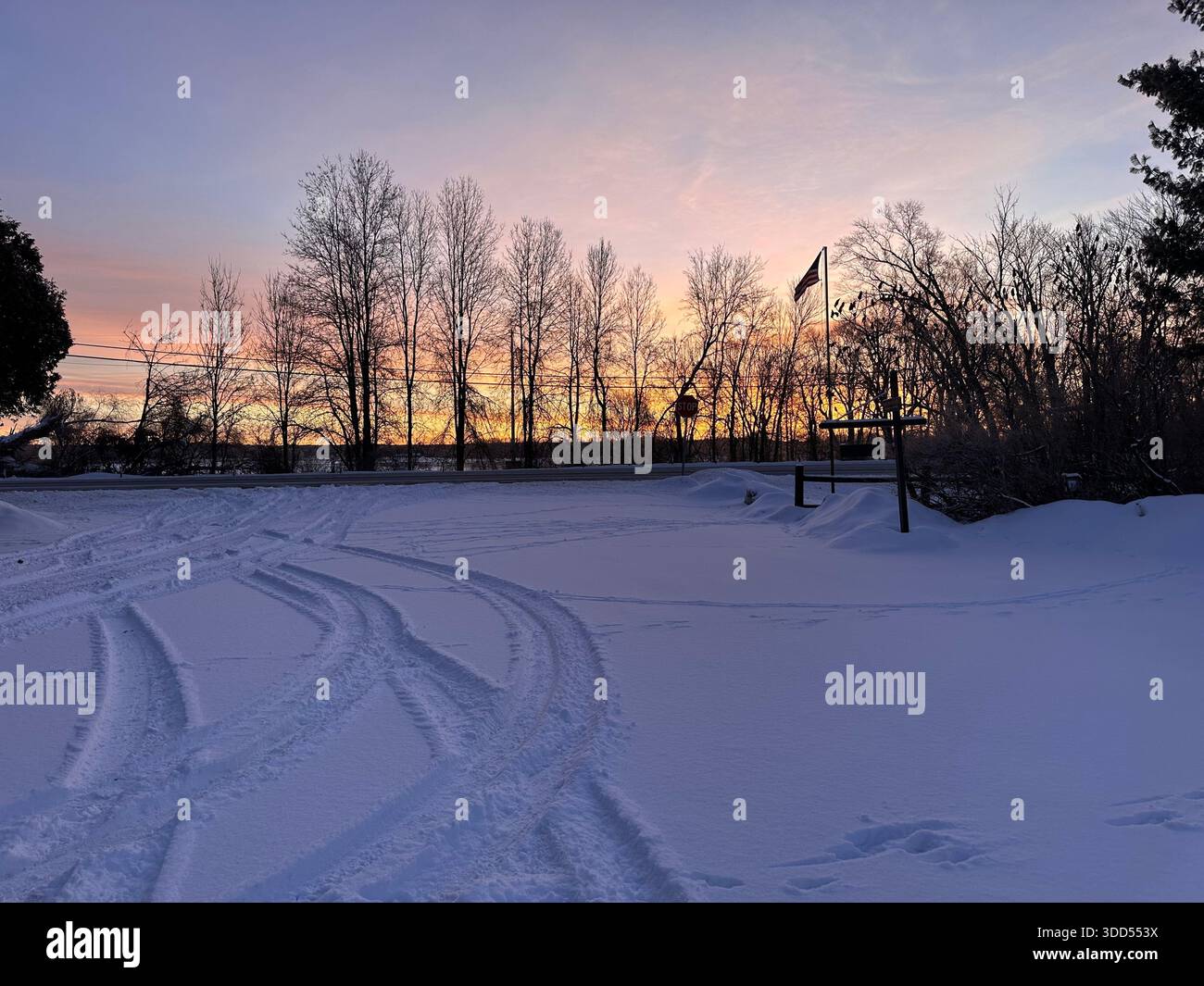 The sun rises over a winter scene in Lowville, N.Y., on Sunday, Dec. 28 ...