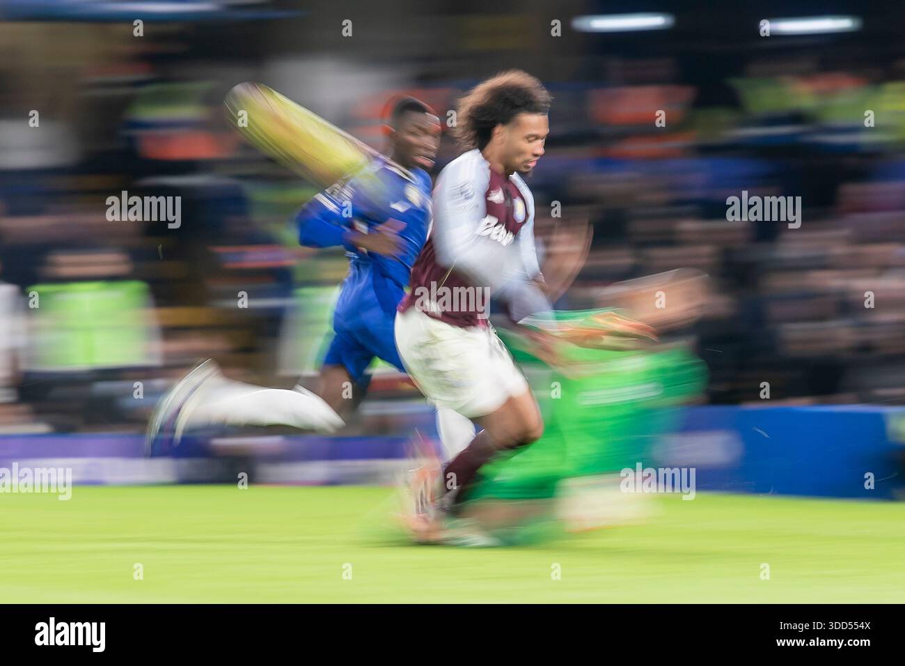 Boubacar Kamara of Aston Villa and Robert Sánchez of Chelsea battle for ...