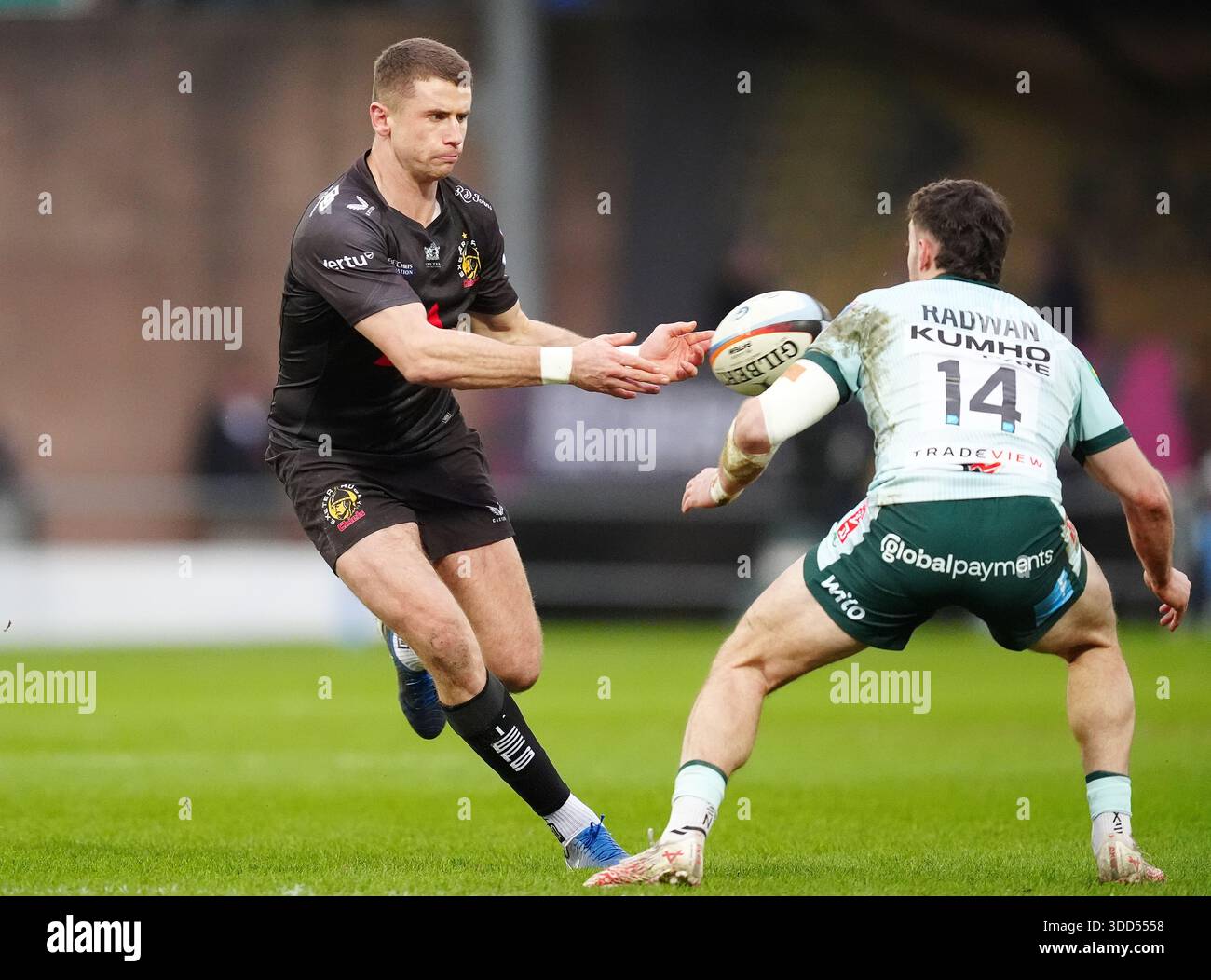 Exeter Chiefs' Harvey Skinner (left) and Leicester Tigers' Adam Radwan ...