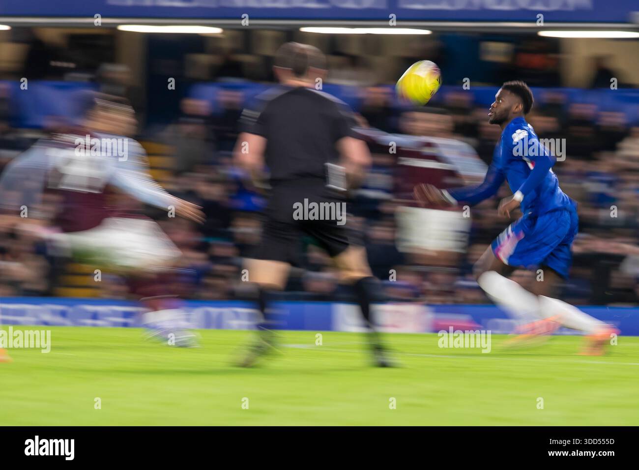 Benoît Badiashile of Chelsea and Jadon Sancho of Aston Villa battle for ...