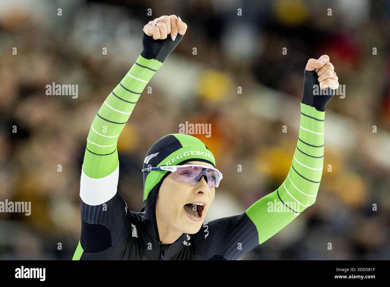 HEERENVEEN - Femke Kok celebrates the fastest time in the first 500m ...