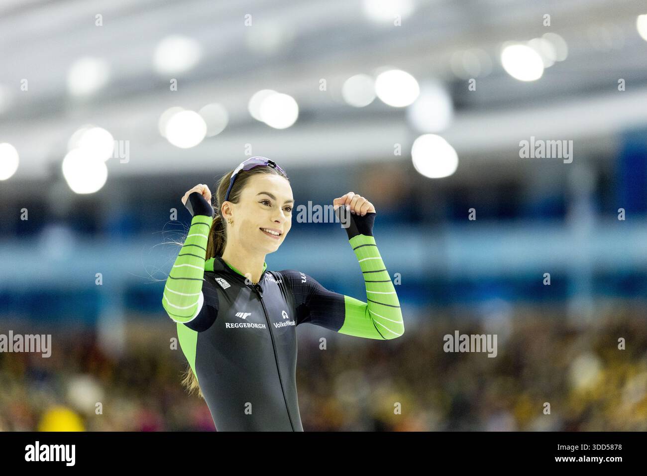 HEERENVEEN - Femke Kok celebrates the fastest time in the first 500m ...