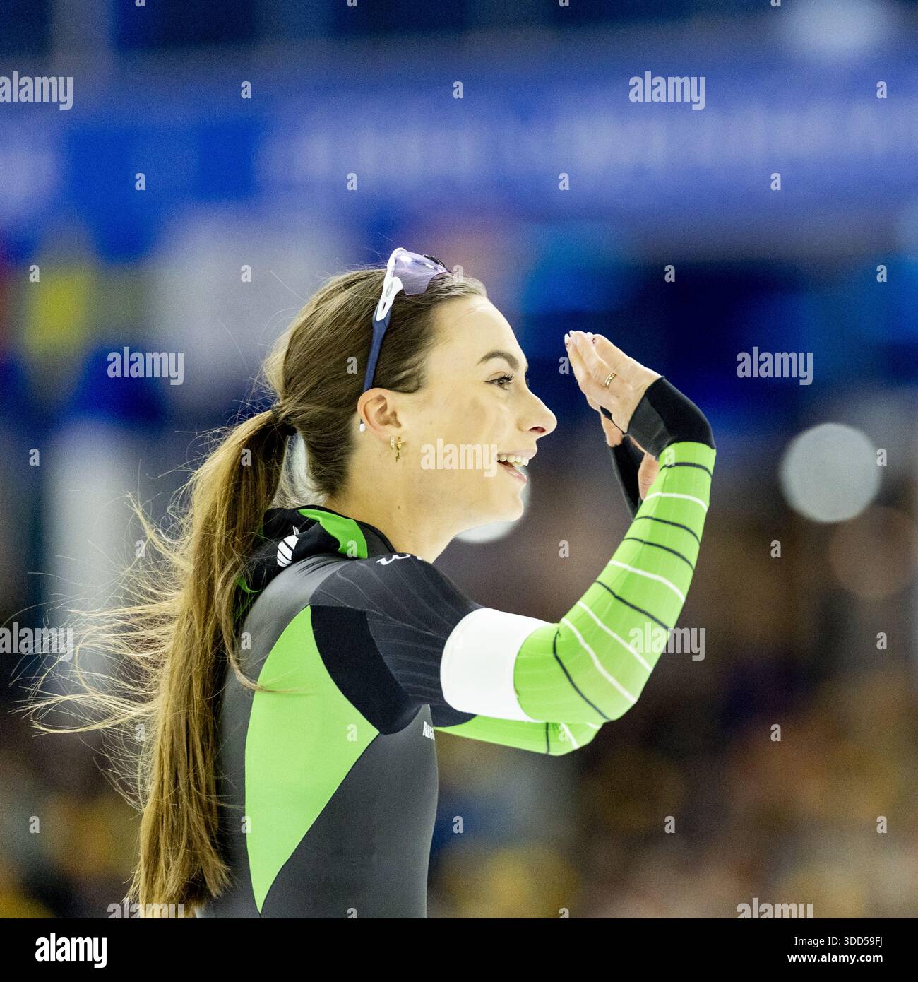 HEERENVEEN - Femke Kok celebrates the fastest time in the first 500m ...