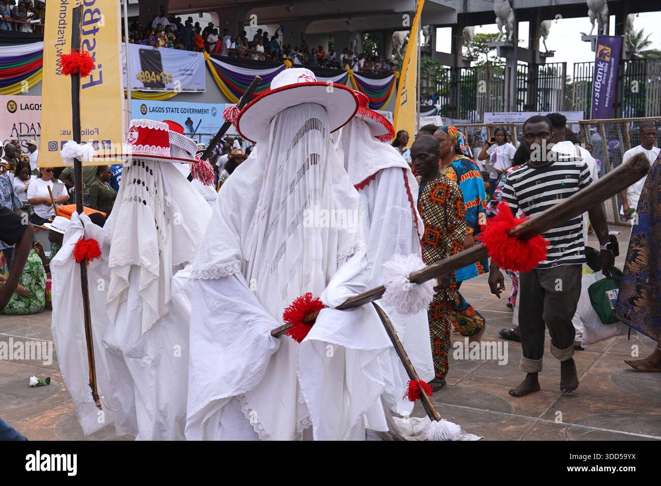 Eyos, or costumed dancers, participate in an event for the Eyo Festival ...