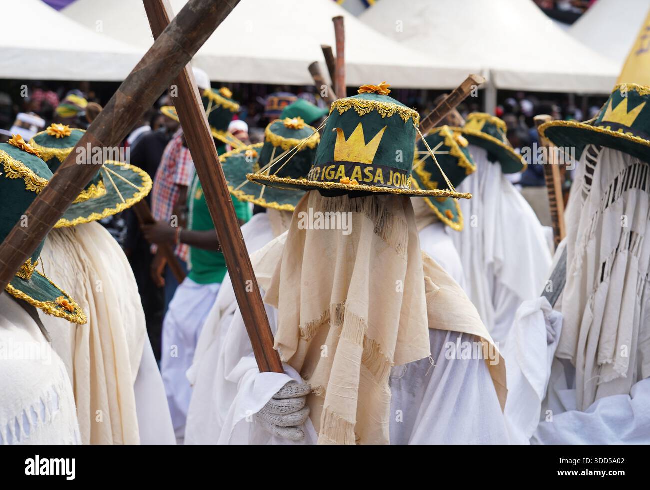 Eyos, or costumed dancers, participate in an event for the Eyo Festival ...