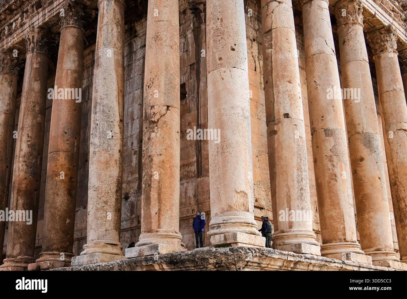 Tourists visit the Temple of Bacchus at the Roman acropolis in the ...