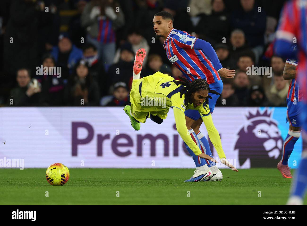 Tottenham's Djed Spence, left, and Crystal Palace's Maxence Lacroix ...