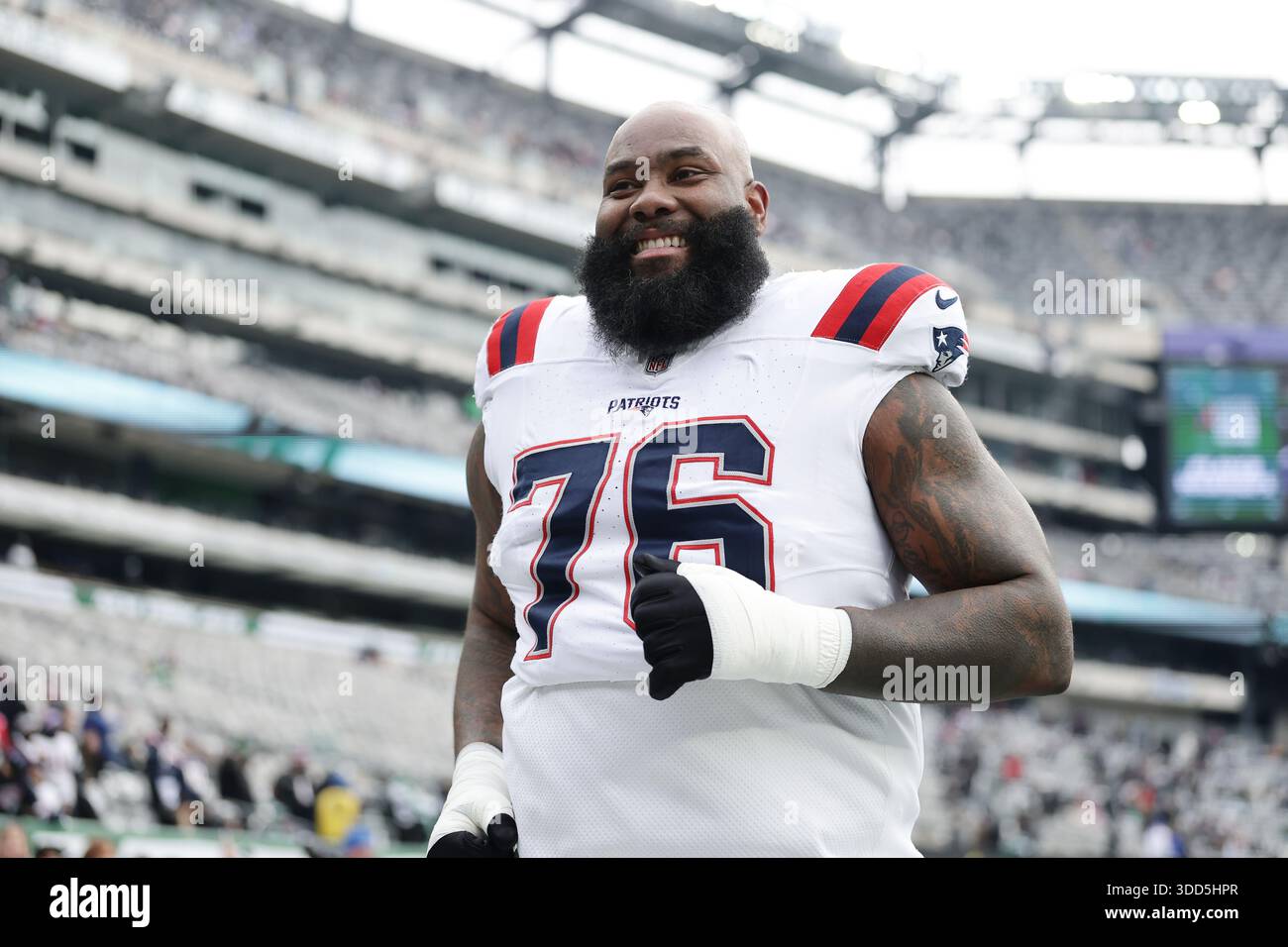 New England Patriots offensive tackle Morgan Moses smiles while running ...