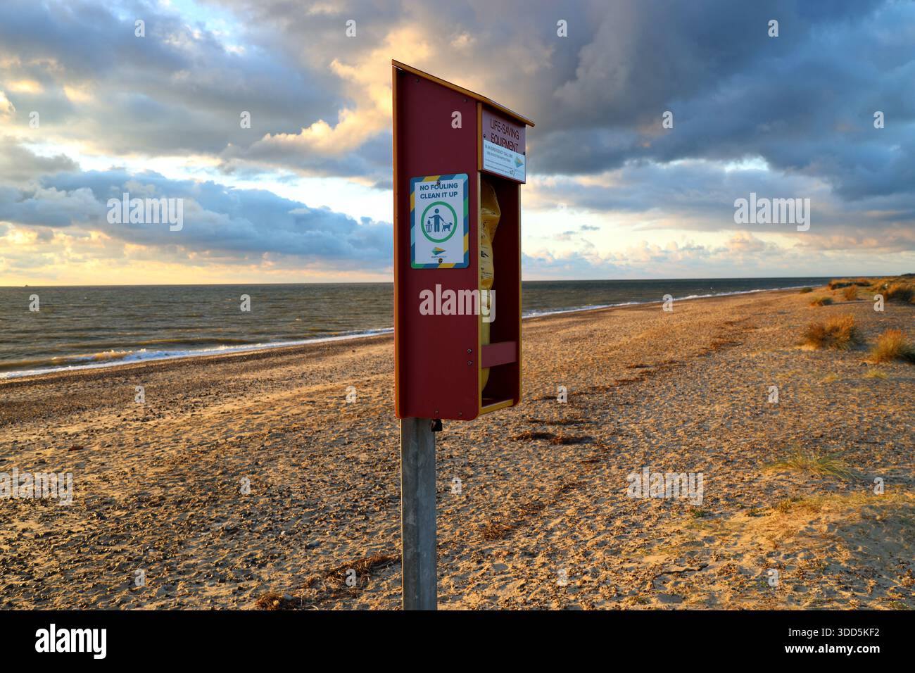 Lifebuoy in beach cabinet at sunrise — lifesaving equipment at ...