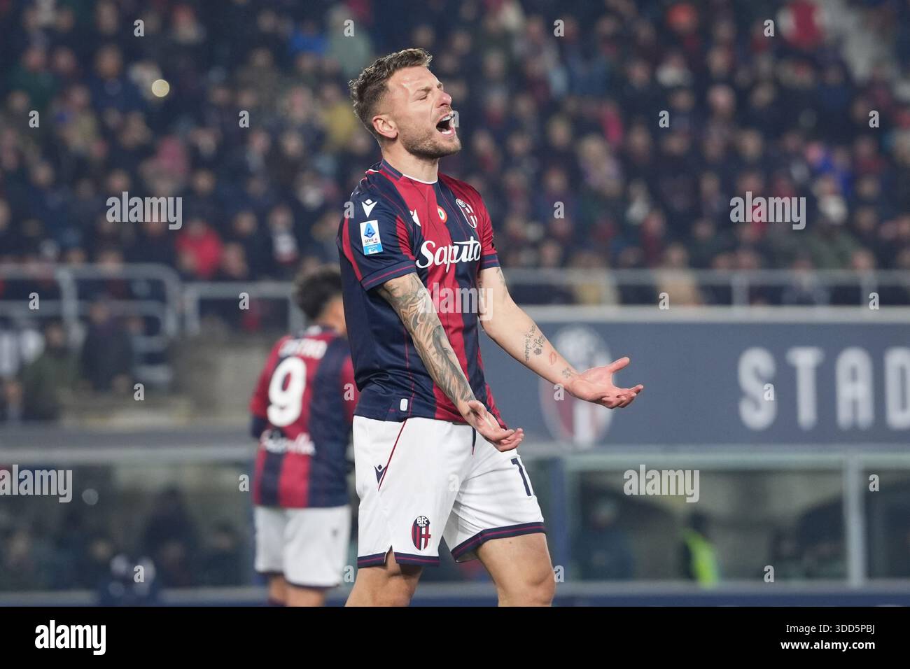 Bologna's Ciro Immobile reacts after missing a scoring chance during ...