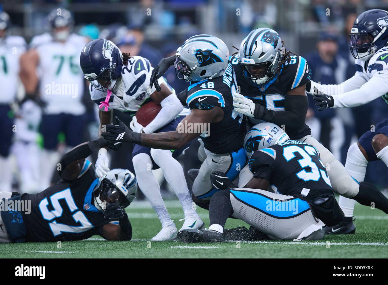 Carolina Panthers linebacker Thomas Incoom (48) tackles Seattle ...