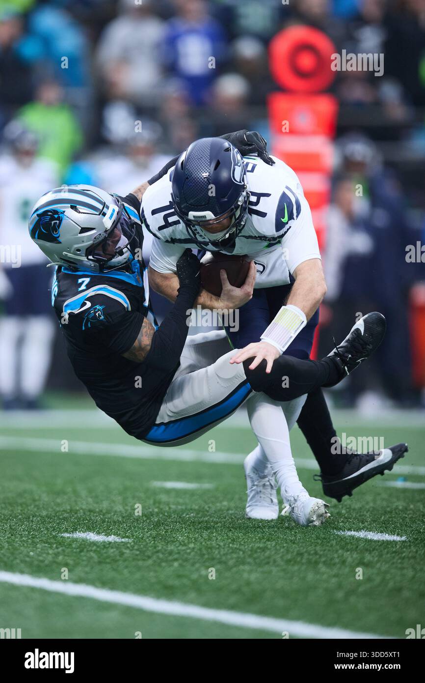 Seattle Seahawks quarterback Sam Darnold (14) is sacked by Carolina ...