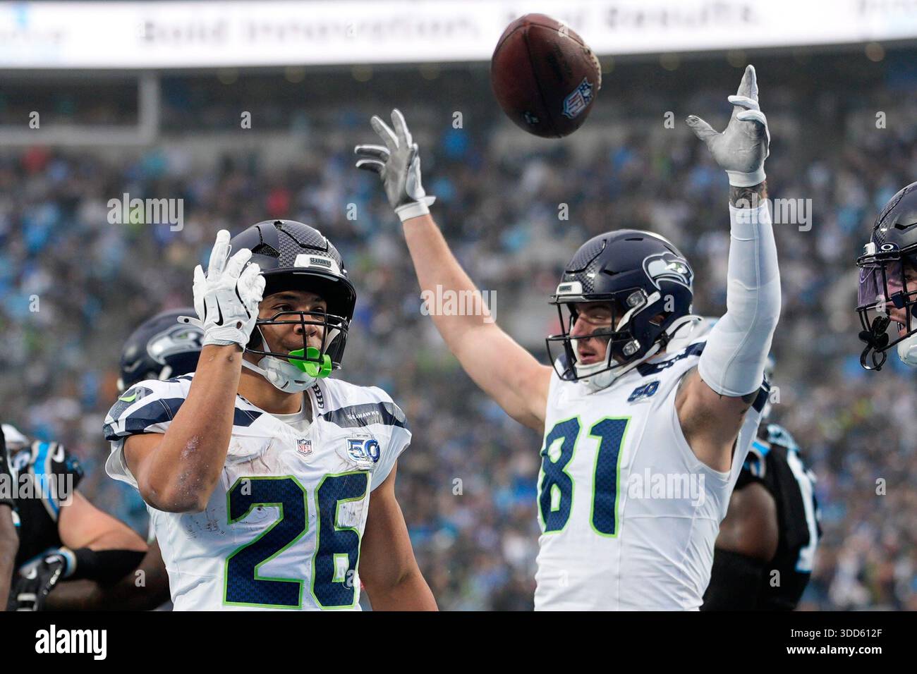 Seattle Seahawks running back Zach Charbonnet celebrates after scoring ...