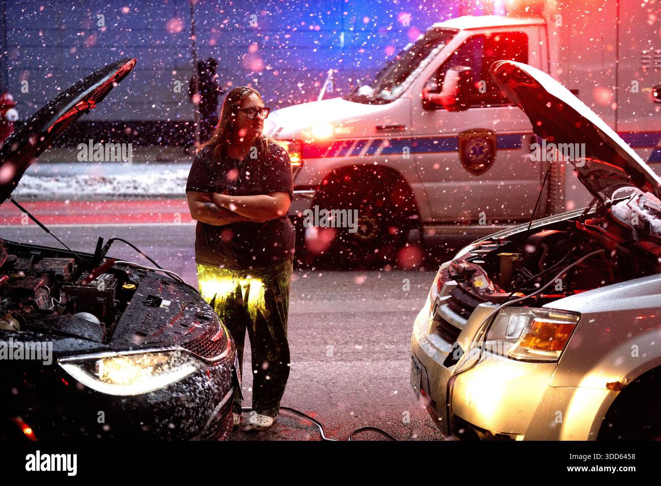 Devon Jordan, of Brainerd , helps a person start their car durning ...