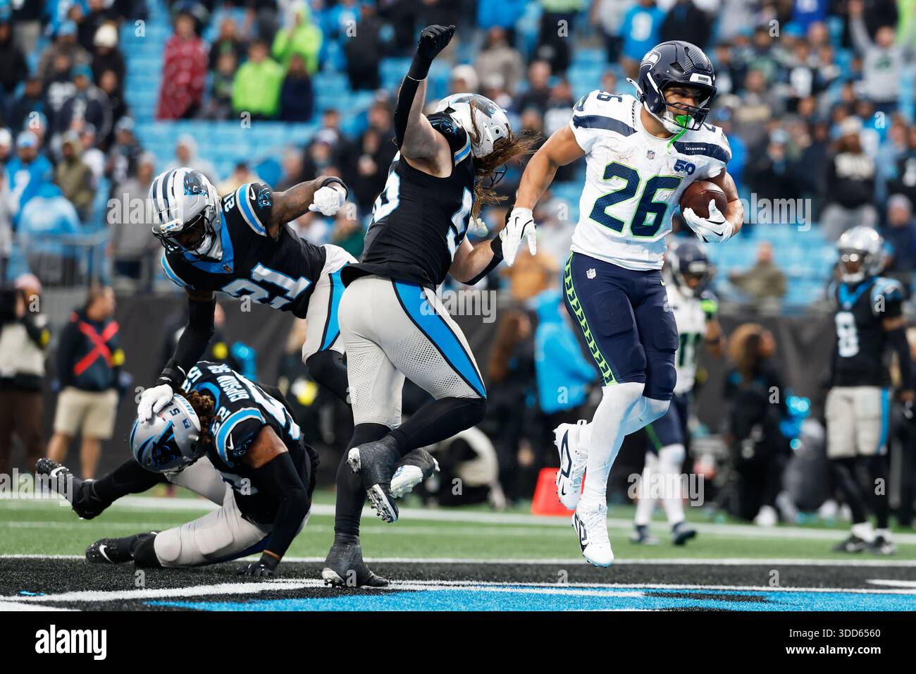 Seattle Seahawks running back Zach Charbonnet scores against the ...