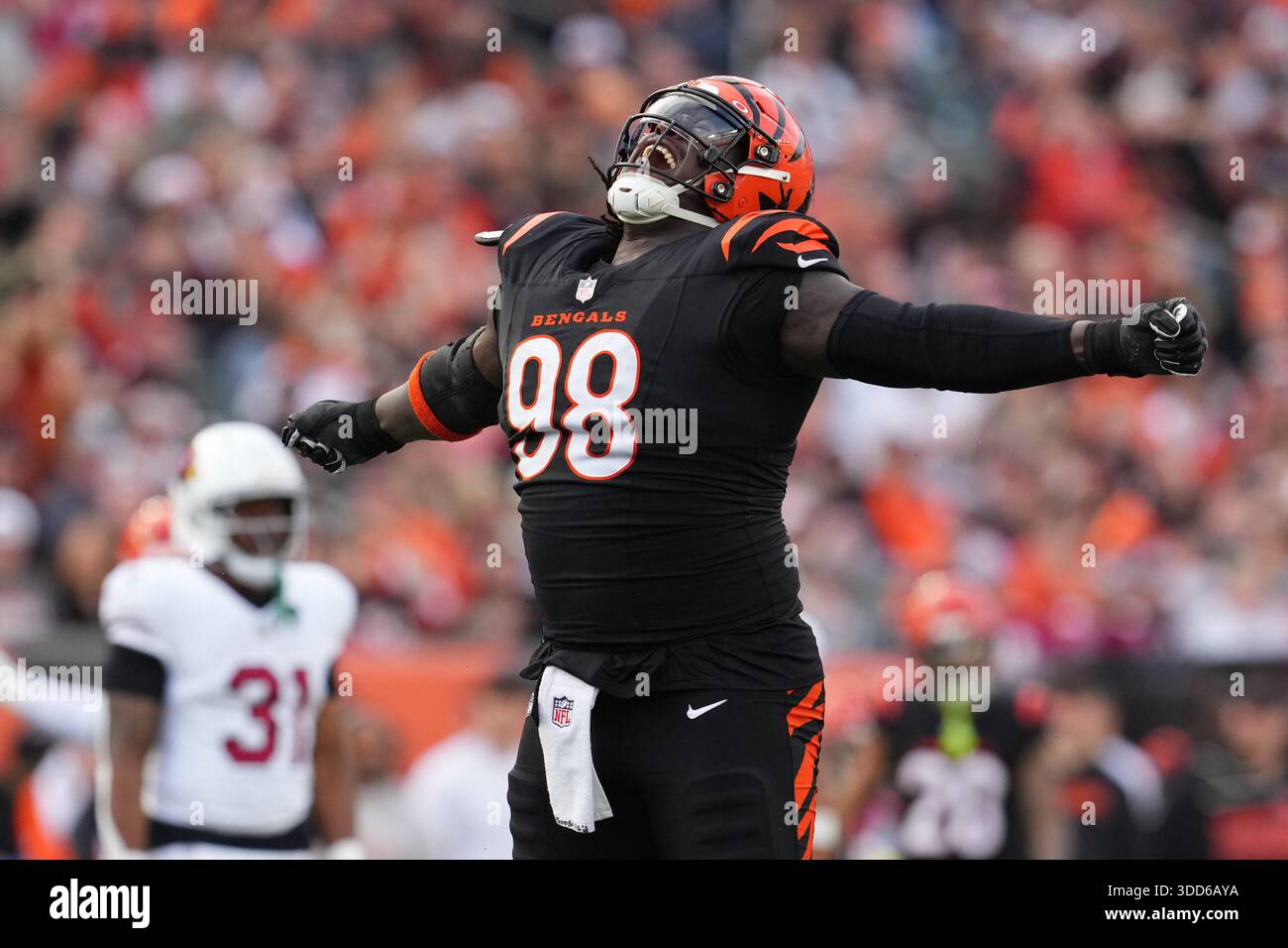 Cincinnati Bengals defensive tackle T.J. Slaton Jr. (98) reacts after ...