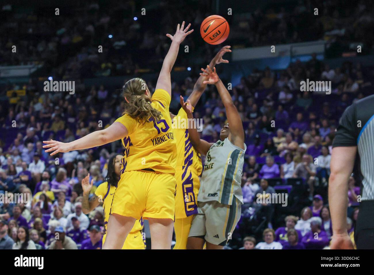 LSU forward Meghan Yarnevich (15) blocks a shot by Alabama State guard ...