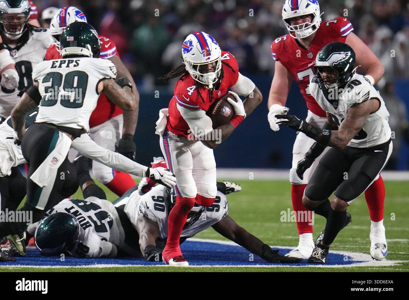 Buffalo Bills' James Cook runs during the first half of an NFL football ...