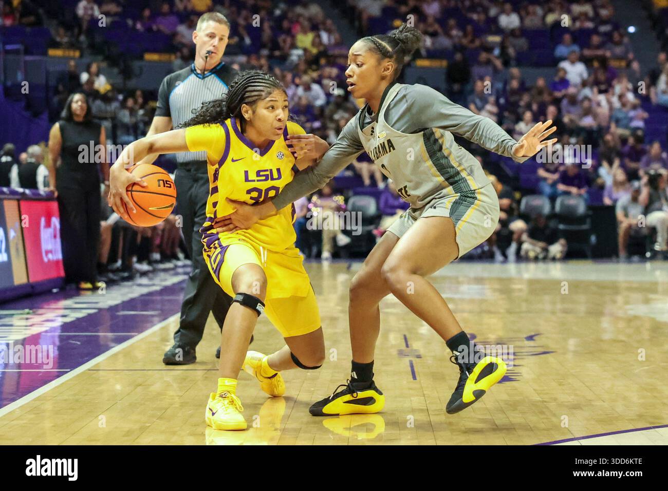 LSU guard Jada Richard, left, tries to get past Alabama State guard ...
