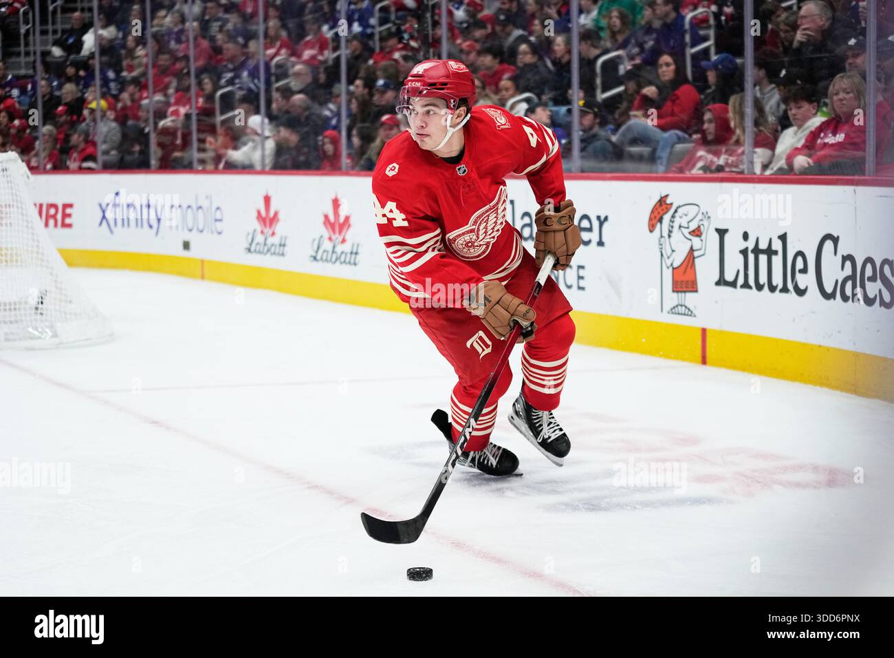 Detroit Red Wings defenseman Axel Sandin-Pellikka moves the puck during ...
