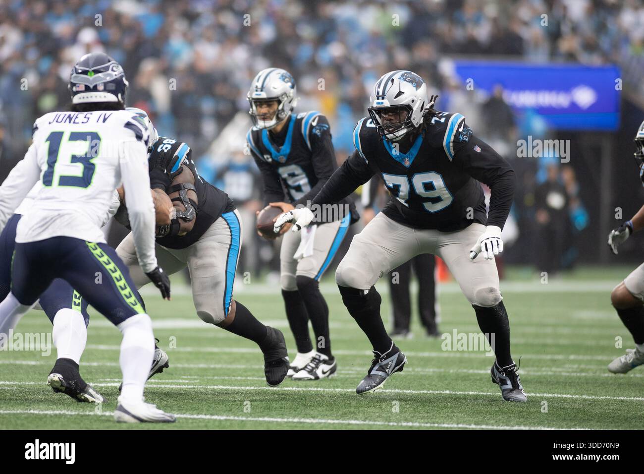 Carolina Panthers offensive tackle Ikem Ekwonu (79) sets up a block at ...