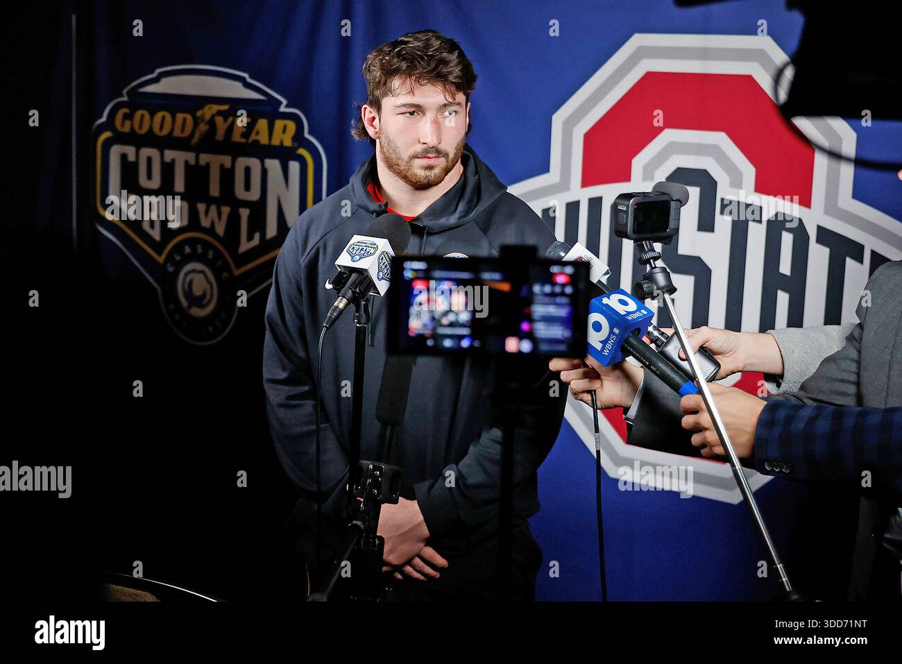 Ohio State linebacker Payton Pierce speaks to reporters after arriving ...