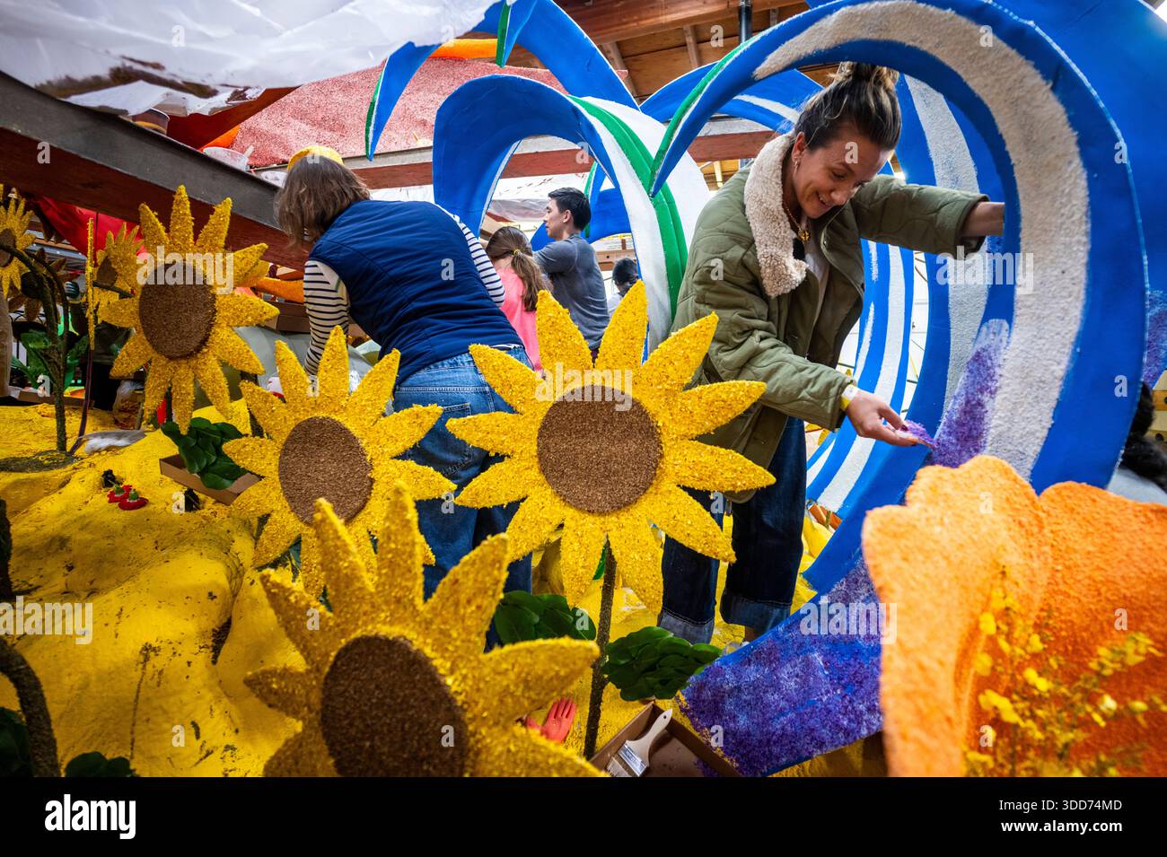 Volunteers work on a float for the 137th Rose Parade in Pasadena ...