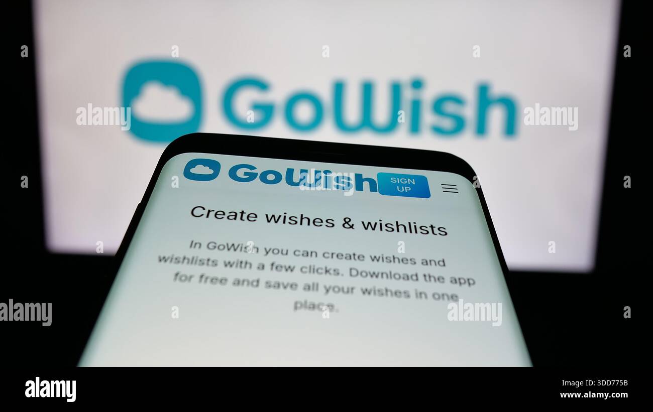 In this photo illustration, a mobile phone with the website of digital ...