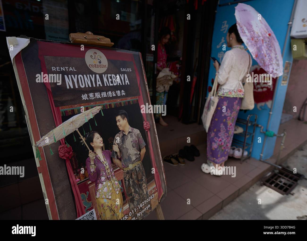 Malaysia, Melaka. Chinese culture & religion. Customers wore their ...