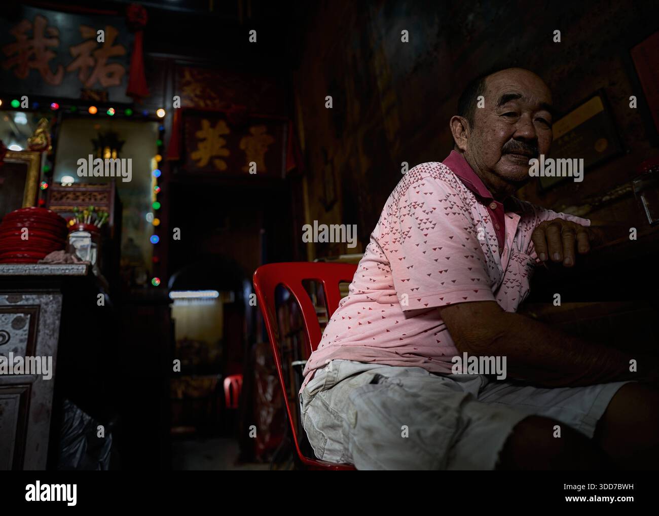 Malaysia, Melaka. Chinese culture & religion & temple. A care taker of ...