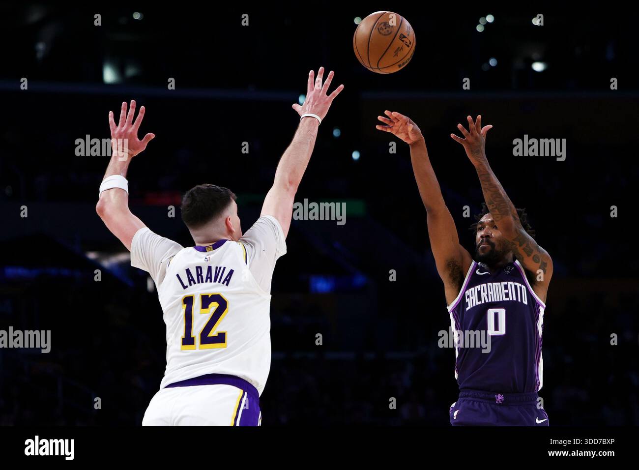 Sacramento Kings guard Malik Monk (0) shoots against Los Angeles Lakers ...