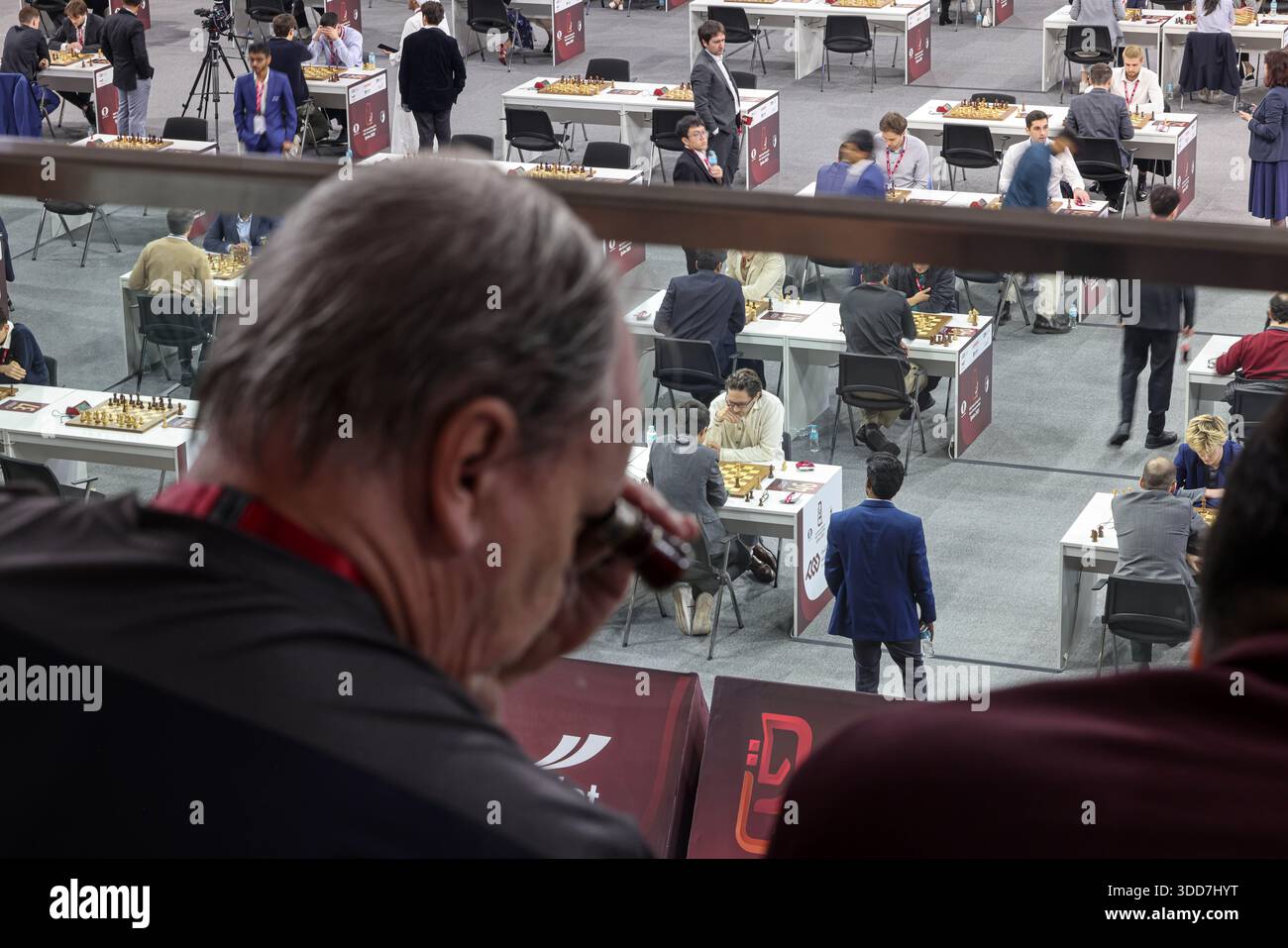 People watch the competitors at their tables during the 2025 World ...