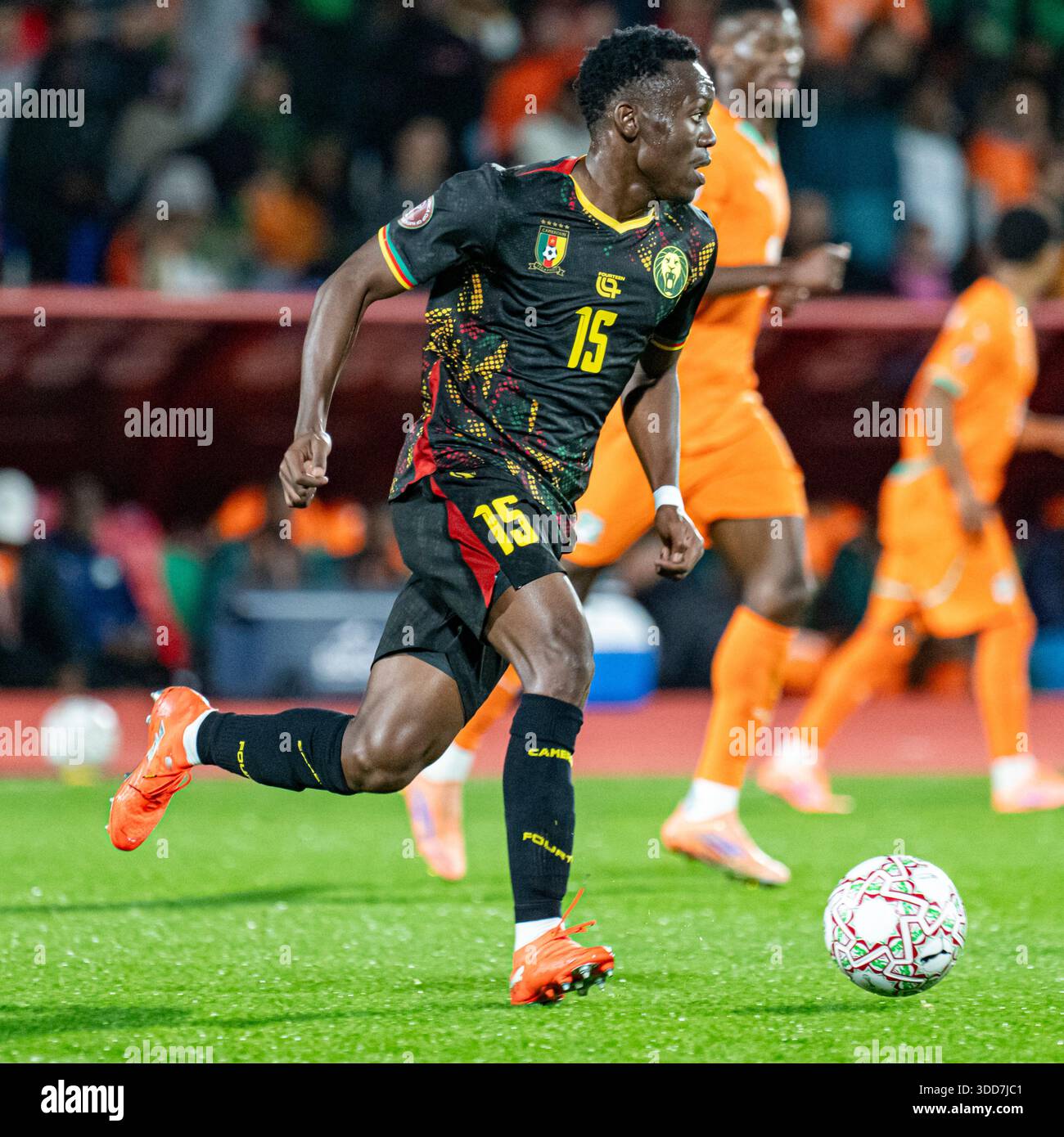 Arthur Avom of Cameroon runs with the ball during the Africa Cup of ...