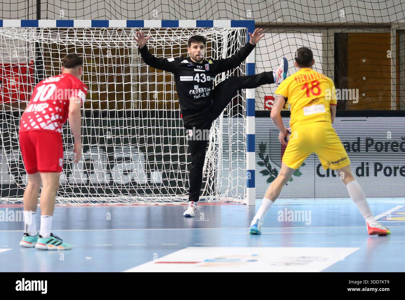Dino Slavic of Croatia tries to saves a shoot from Filip Kuzmanovski of ...
