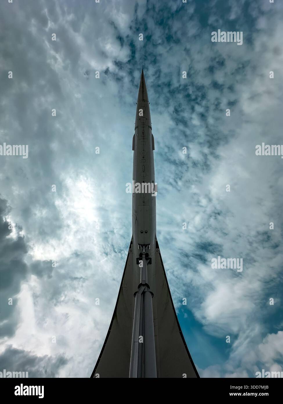 Low angle view of the underside of a commercial passenger aircraft ...