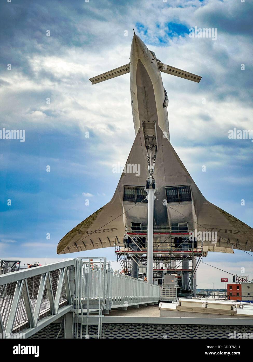 Low angle view of the underside of a commercial passenger aircraft ...
