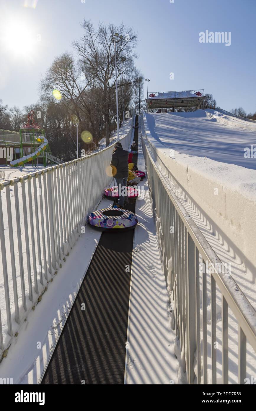 People enjoy snow fun at a ski resort in Jilin City, northeast China's ...
