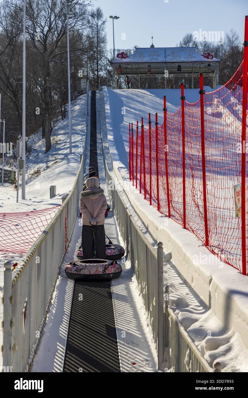 People enjoy snow fun at a ski resort in Jilin City, northeast China's ...