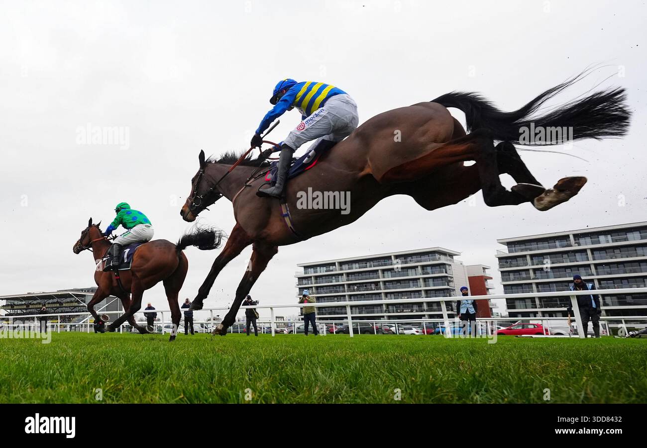 Minella Yoga ridden by Harry Cobden (left) on their way to winning the ...